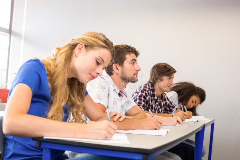 Students writing exam stock photo. Image of break, shirt - 51049634