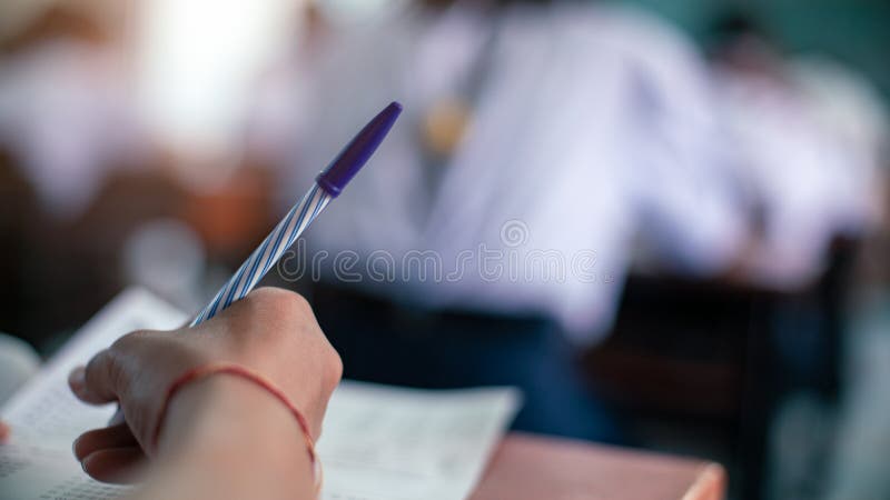 Students Writing and Reading Exam Answer Sheets Exercises in Classroom ...