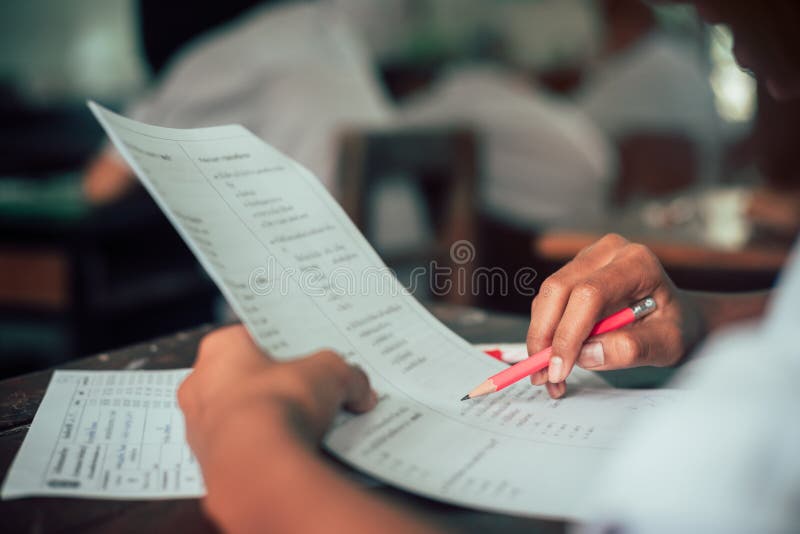Students Writing and Reading Exam Answer Sheets Exercises in School ...