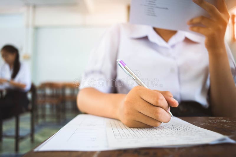 Students Writing and Taking Exam with Stress in Classroom.16:9 Style ...