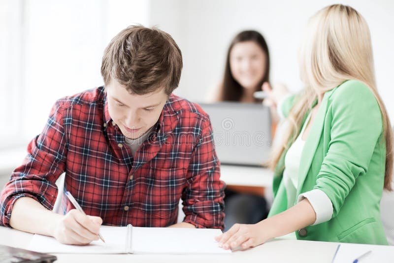Students Writing Something at School Stock Image - Image of nice ...