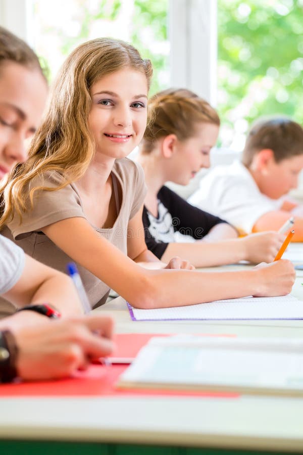 Group of School Kids Writing Test in Classroom Stock Image - Image of ...