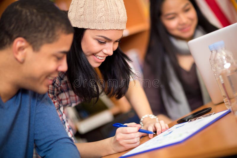 Students Writing Their Task Stock Image - Image of attractive ...
