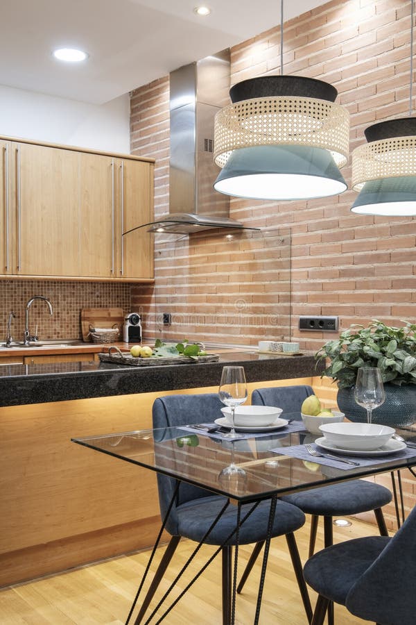 Studio Apartment with Open Plan Kitchen with Glass Dining Table and ...