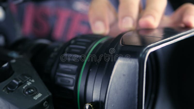 Studio Camera. Cameraman Changing Camera Settings Focal Length ...