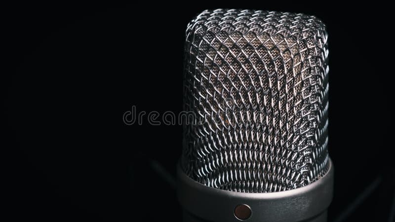 The Studio Condenser Microphone Rotates on a Black Background Close-Up ...