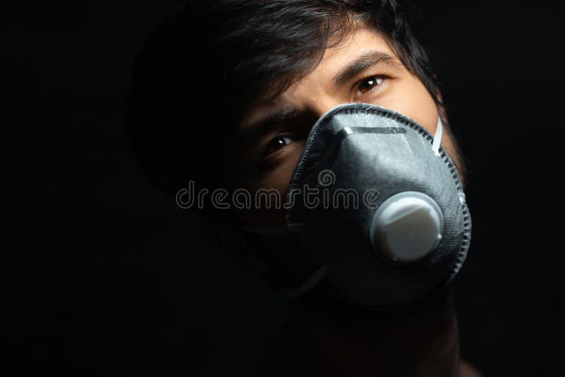 Studio Dramatic Dark Portrait. Close-up of Young Man Wearing Protective ...