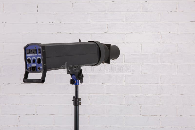 Large Professional Photo Studio Lamps on a White Brick Wall Stock Image ...