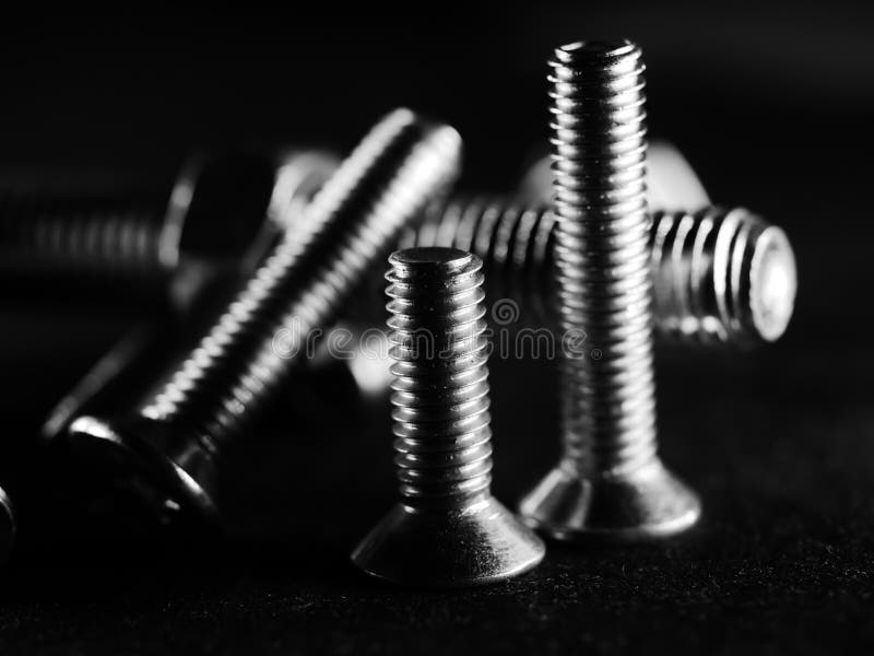 Studio Grayscale of Screws on Black Background Stock Image - Image of ...