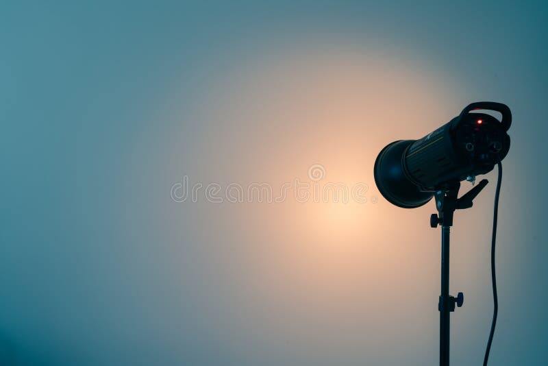 Studio Light on the Stand. Spotlight on White Wall Background Stock ...