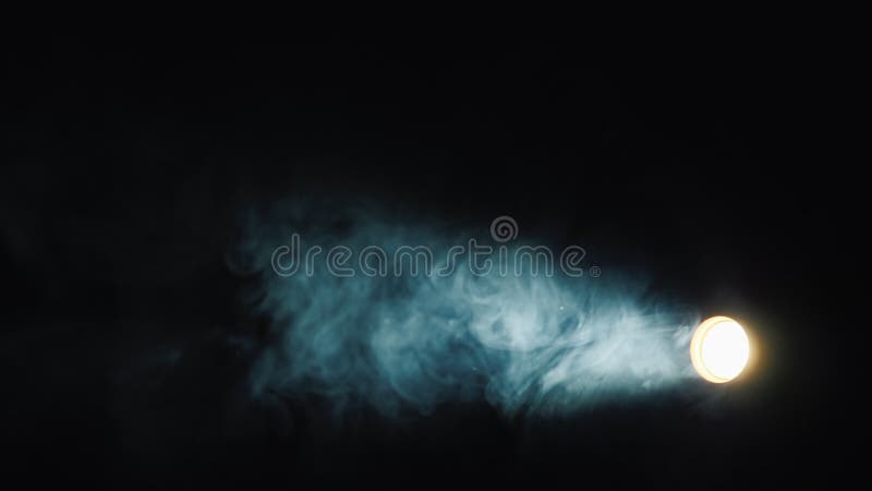 Studio Lighting Device with a Narrow Beam Illuminates Smoke in the Dark ...