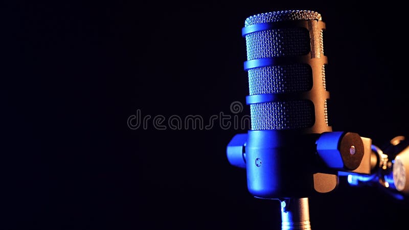 Studio Microphone with Dramatic Yellow and Blue Lighting Stock Photo ...