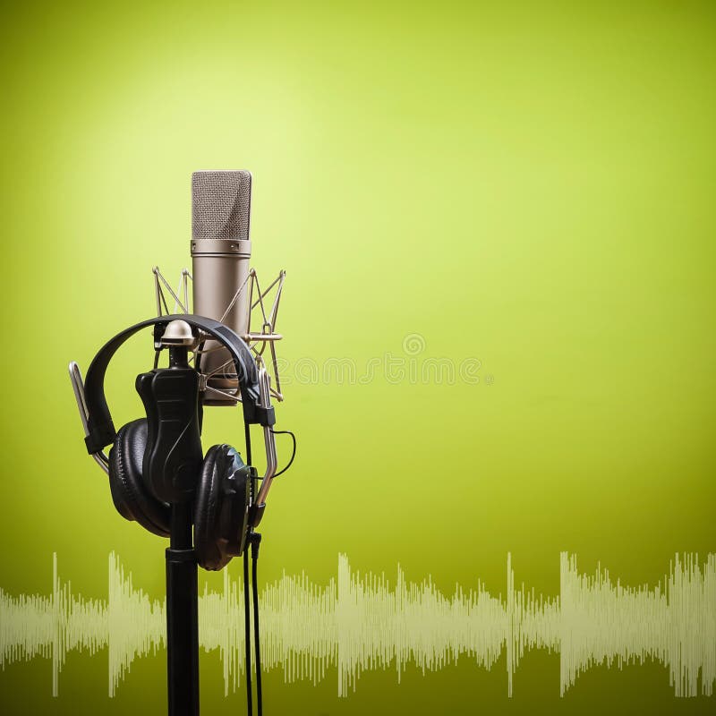 Studio Microphone and Headphones on a Green Background Stock Photo ...