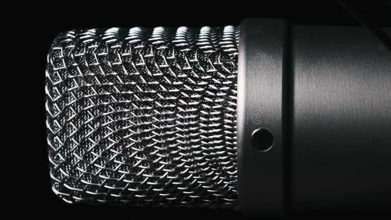 Studio Microphone Rotates on a Black Background Close-Up Stock Footage ...