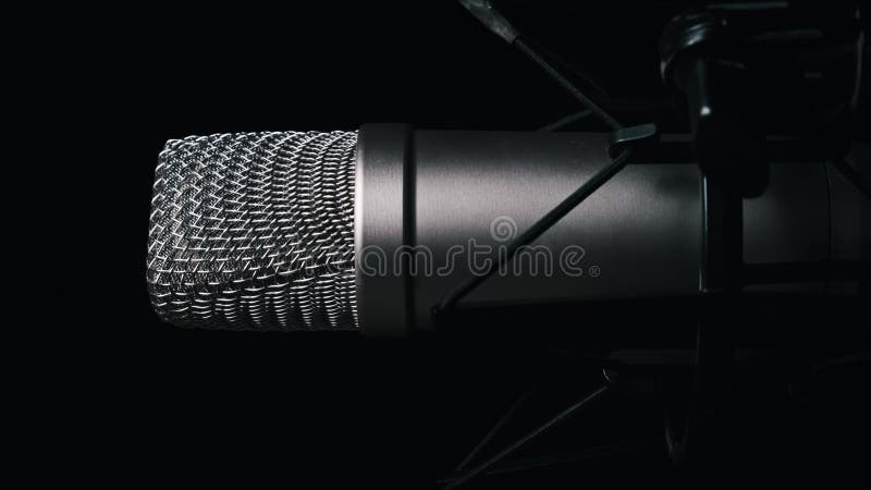 Studio Microphone Rotates on a Black Background Close-Up Stock Footage ...