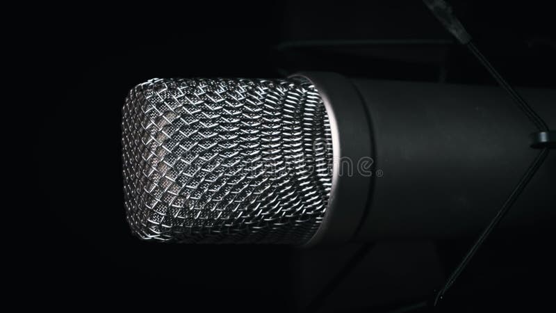 Studio Microphone Rotates on a Black Background Close-Up Stock Footage ...