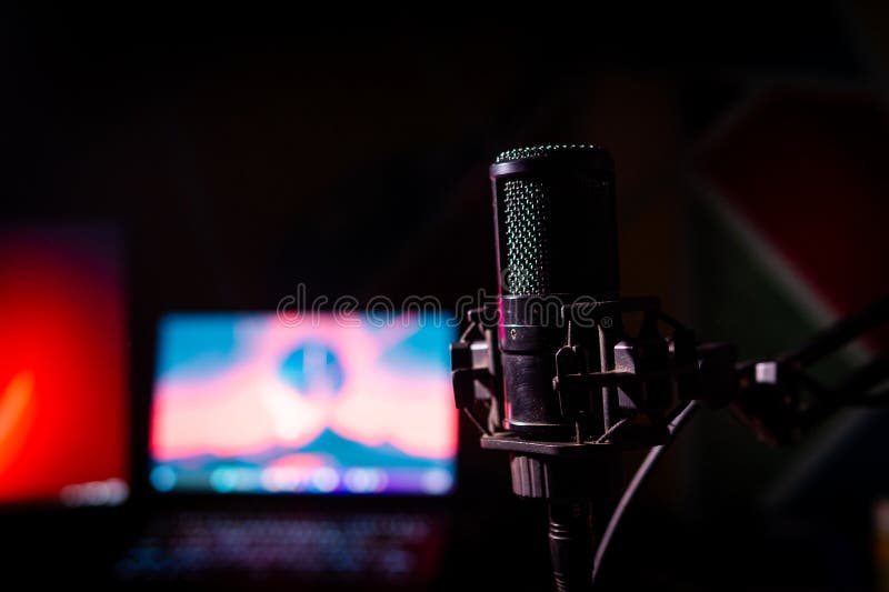 Studio Microphone with Soft Focus Lighting in Dark Ambience Stock Photo ...