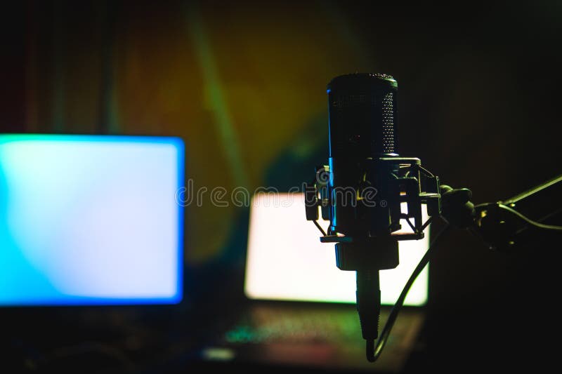 Microphone in Focus on a Brightly Lit Stage with Concert Lights Stock ...