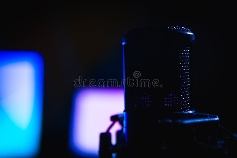 Microphone in Focus on a Brightly Lit Stage with Concert Lights Stock ...