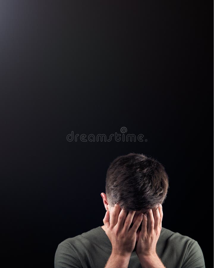 Studio Portrait of Ashamed Young Man Covering Face with Hands Stock ...