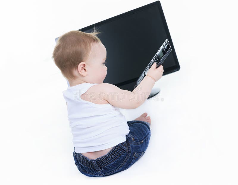 Studio Portrait of a Baby Boy Holding a Tv Remote Stock Photo - Image ...