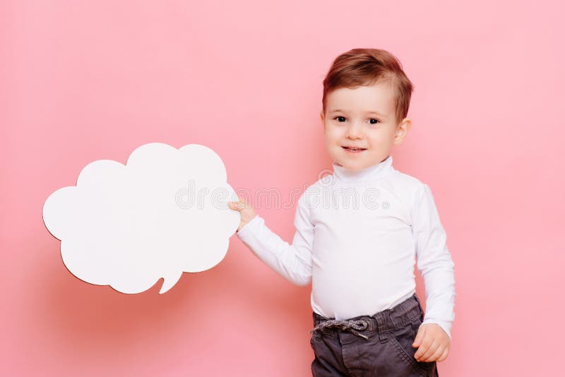 Studio Portrait of a Boy with a Blank White Board in the Shape of a ...