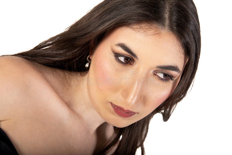 Brunette Model Looking Down with Bare Shoulders and Elegant Makeup ...