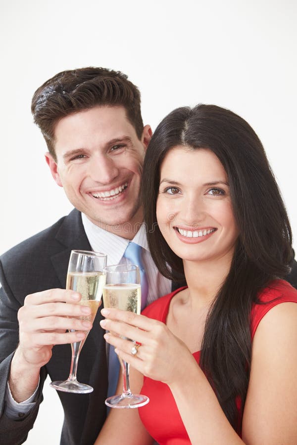 Studio Portrait of Couple Celebrating with Champagne Stock Photo ...