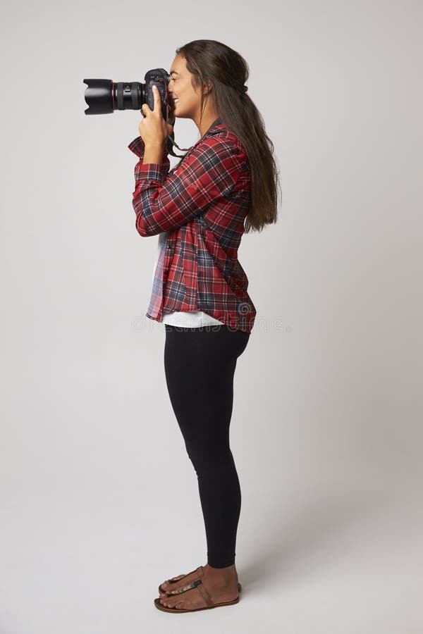 Studio Portrait of Female Photographer with Camera Stock Image - Image ...
