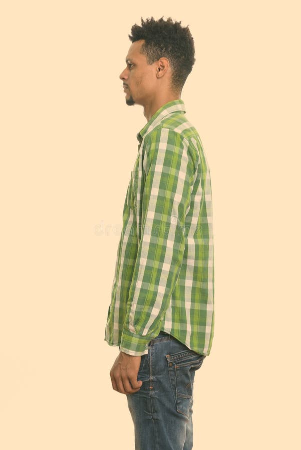 Profile View of Young African Man Standing Stock Photo - Image of ...