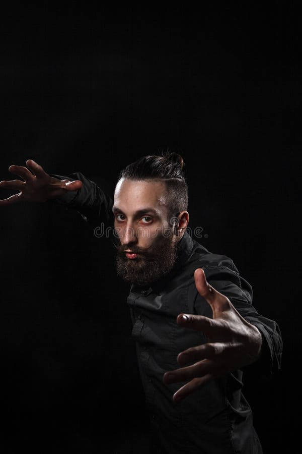 Studio Portrait of a Handsome Man with a Beard Practicing Kung F Stock ...