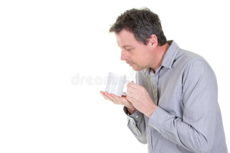 Studio Portrait of Handsome Man Holding Tea Mug or Cup of Coffee Stock ...