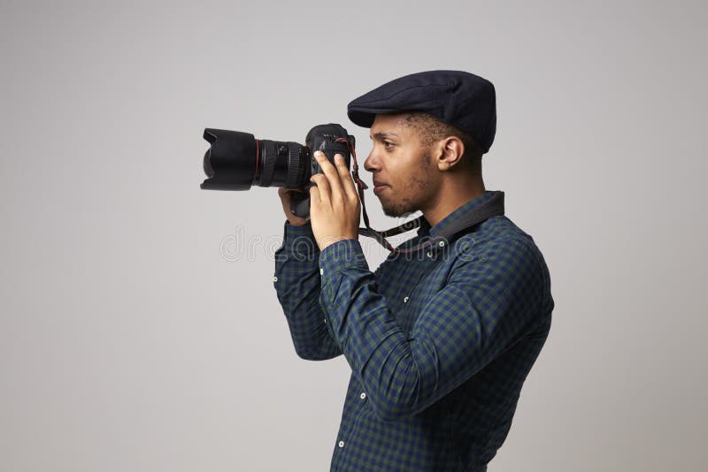 Studio Portrait of Male Photographer with Camera Stock Image - Image of ...