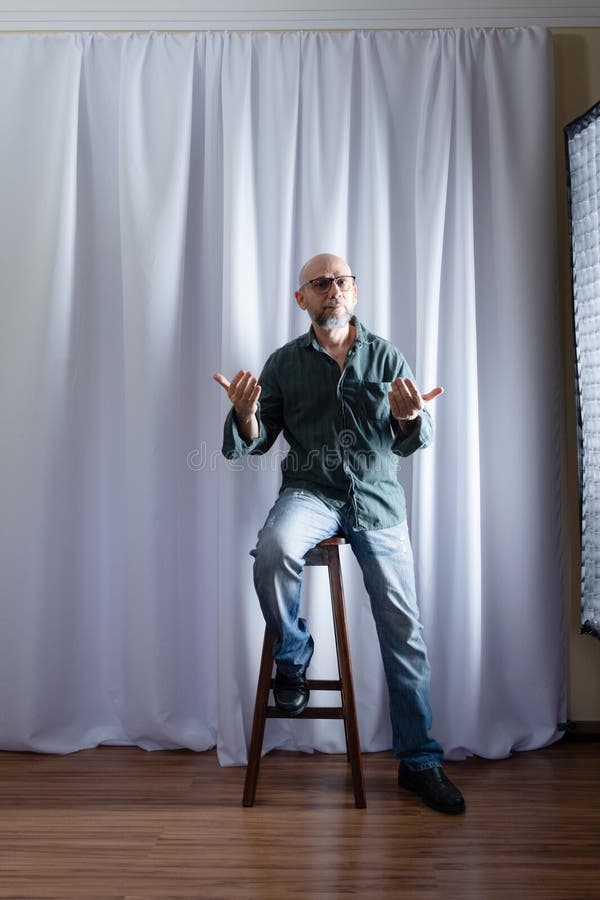 Studio Portrait of a Man Sitting on a Wooden Stool Stock Image - Image ... Studio Portrait of a Man Sitting on a Wooden Stool Stock Image - Image ...