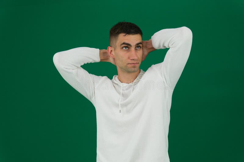 Studio Portrait of a Man Thinking Stock Photo - Image of casual, arms ...