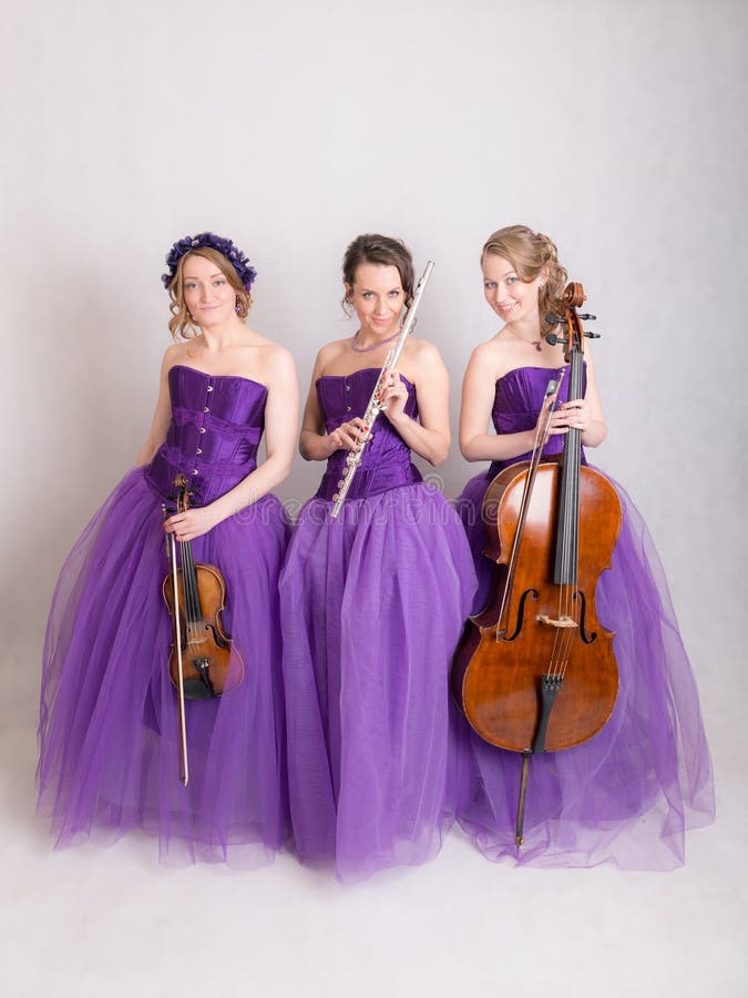 Studio Portrait of a Musical Trio Stock Image - Image of trio ...