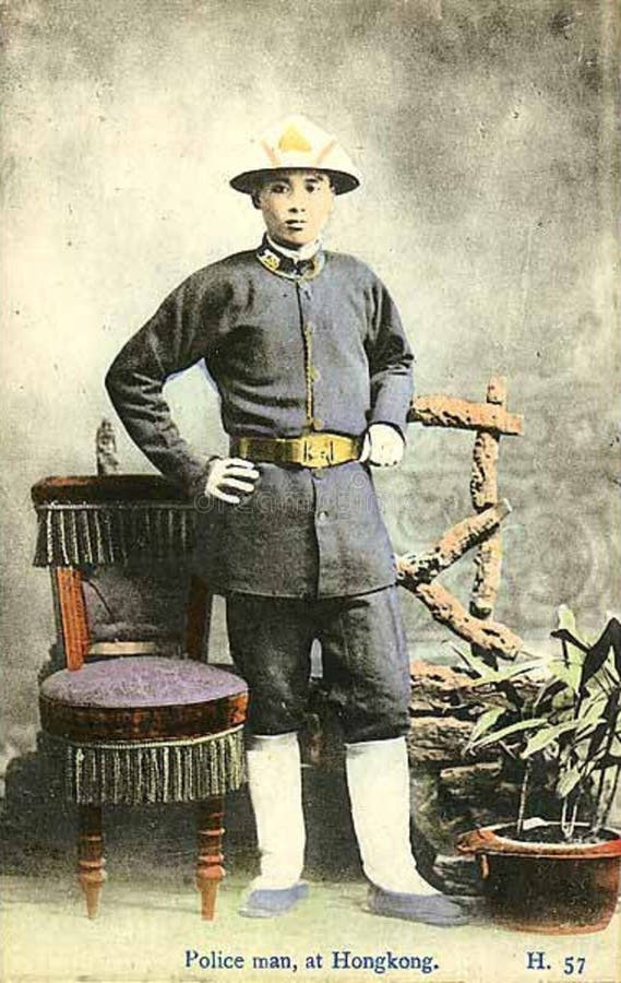 Studio Portrait Of A Policeman, Hong Kong Picture. Image: 222351071