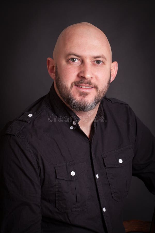 Studio Portrait of Smiling Bold Man with Beard Stock Image - Image of ...