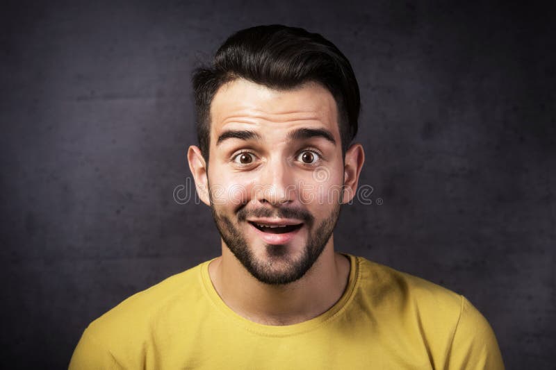 Studio Portrait of a Smiling Youth Looking at Camera. Stock Photo ...