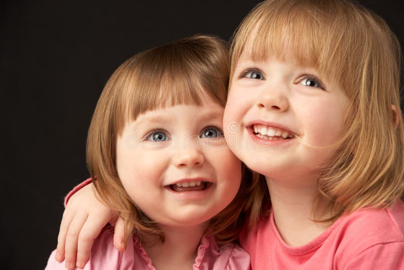 Studio Portrait of Two Sisters Stock Photo - Image of caucasian, fresh ...