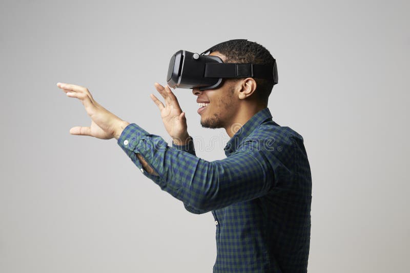 Studio Portrait of Video Game Designer Wearing VR Headset Stock Photo ...