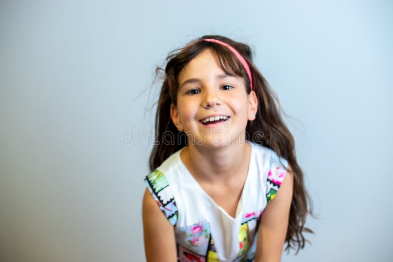 Studio Portrait of Young Child Girl Making Faces Stock Photo - Image of ...