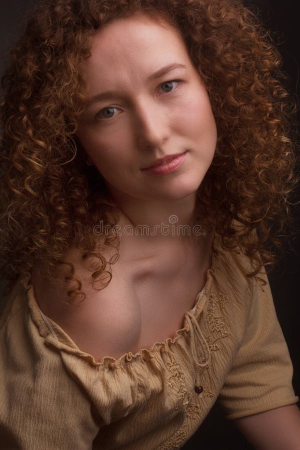 Studio Portrait of Young Woman with Curly Hair Stock Image - Image of ...