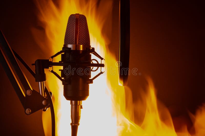 Studio Professional Microphone on the Background of Fire, Effective ...