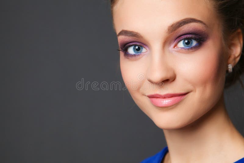 Studio Shot of a Beautiful Young Woman Wearing Professional Makeup ...