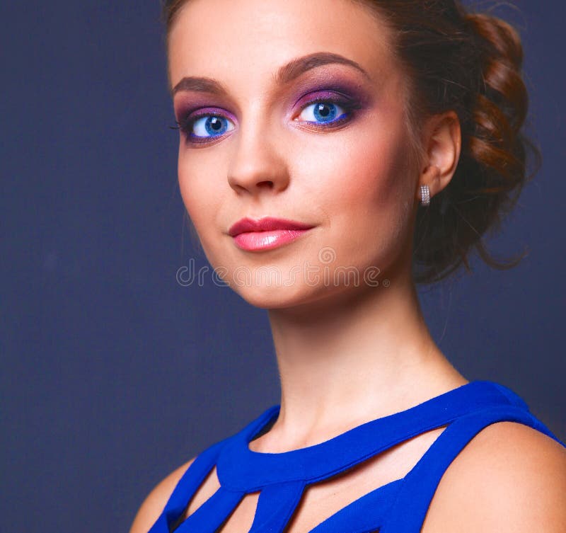 Studio Shot of a Beautiful Young Woman Wearing Professional Makeup ...
