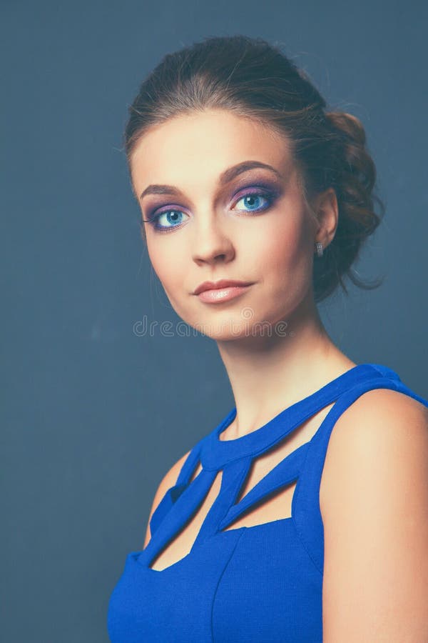 Studio Shot of a Beautiful Young Woman Wearing Professional Makeup ...