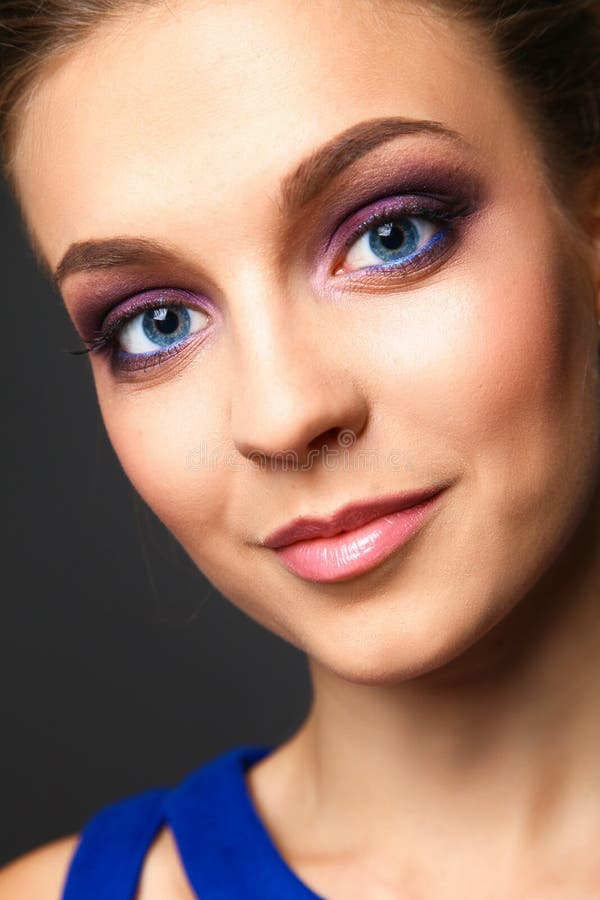 Studio Shot of a Beautiful Young Woman Wearing Professional Makeup ...