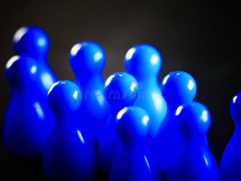 Studio Shot of Blue Monopoly Plastic Chips on Black Background Stock ...