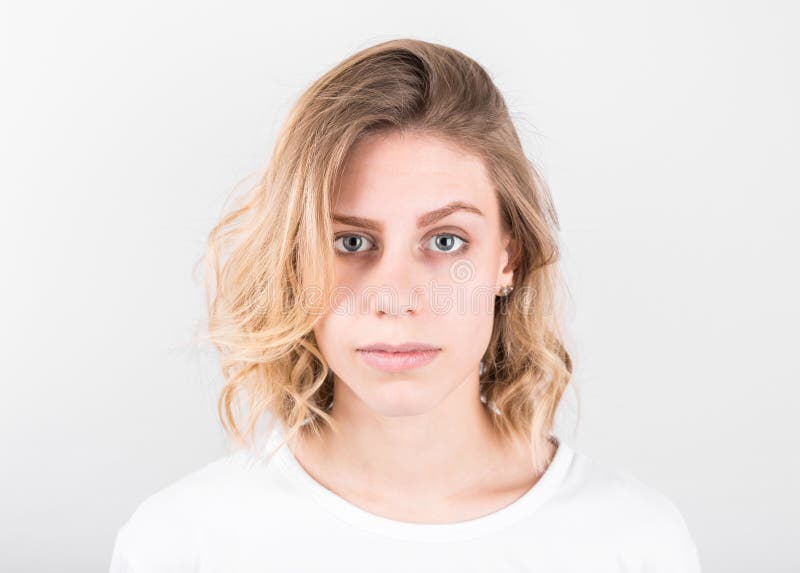 Studio Shot of Cute Blonde Girl with Thoughtful and Sly Expression ...